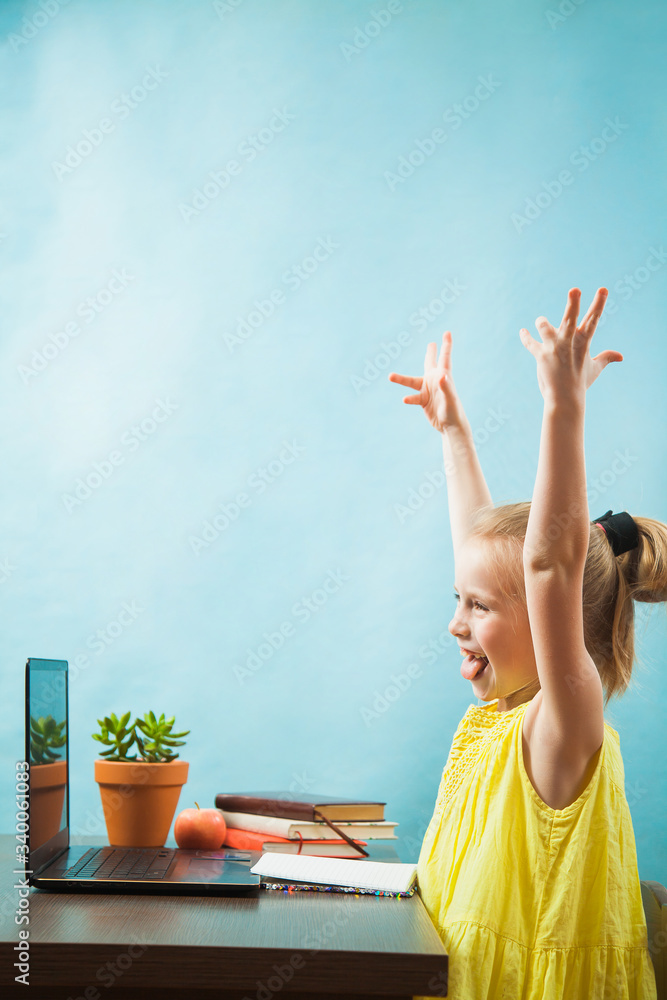 Happy preteen child in delight learn lessons at home on quarantine ...