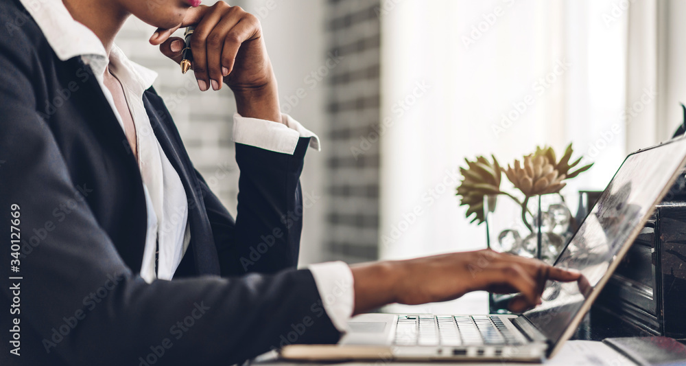 African american black woman relaxing using technology of laptop ...