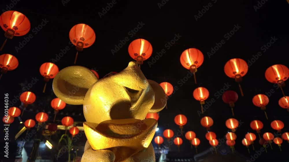 Rat statue, red lantern and fireworks display during chinese new year ...