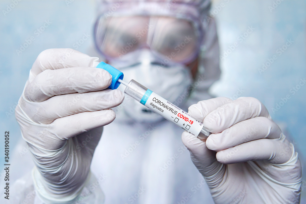 Coronavirus Covid-19 respiratory sputum specimen swab test tube with ...