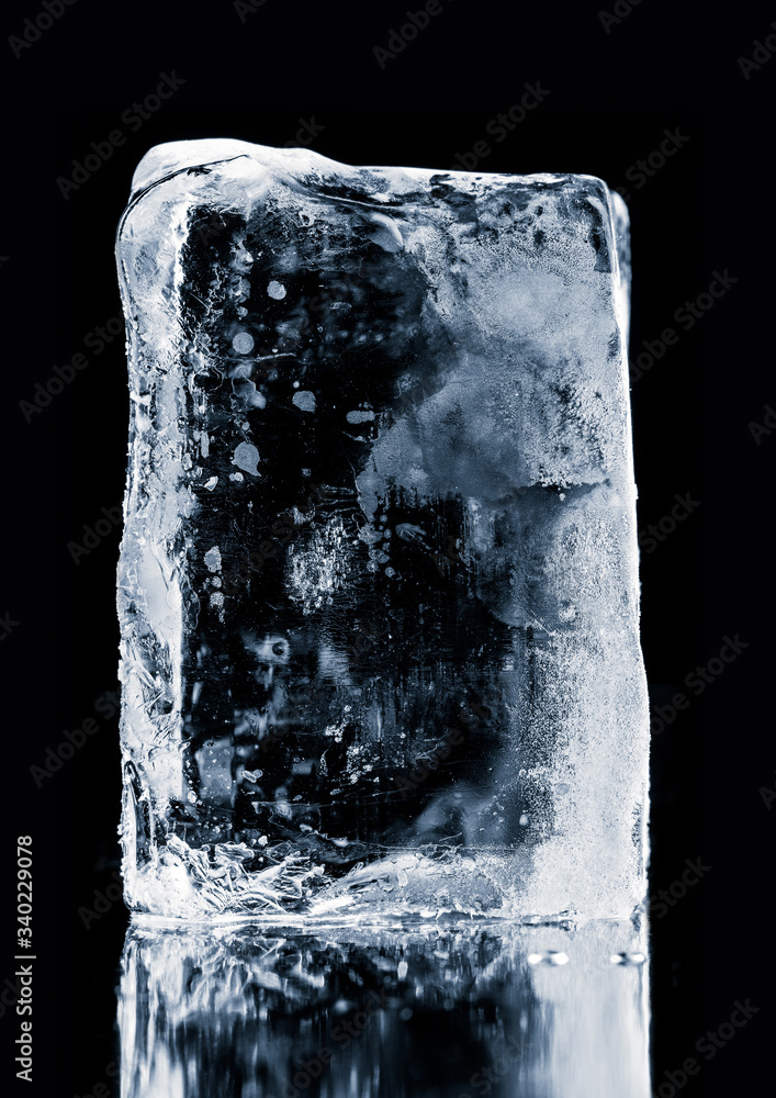 Crystal clear, textured, natural ice block, on black background ...