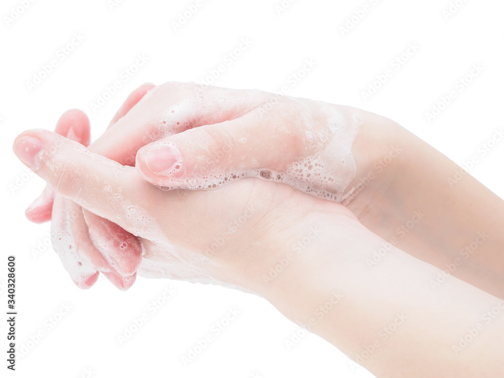 Two hands in disinfectant soap foam close-up on a white background ...