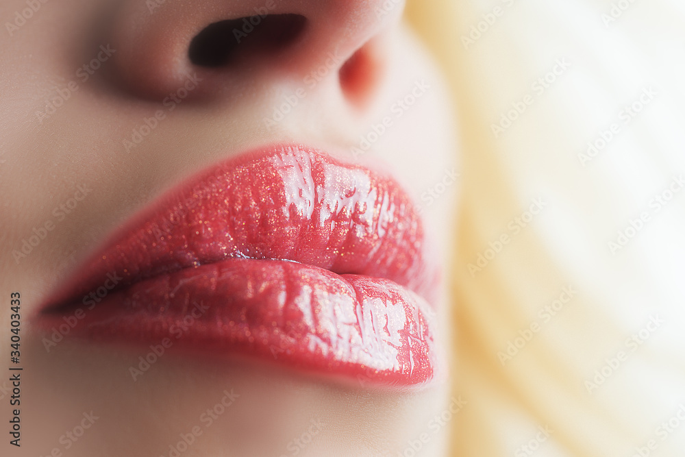 Lips. Beautiful woman close-up. Blonde. Lip gloss. Close-up Beautiful ...