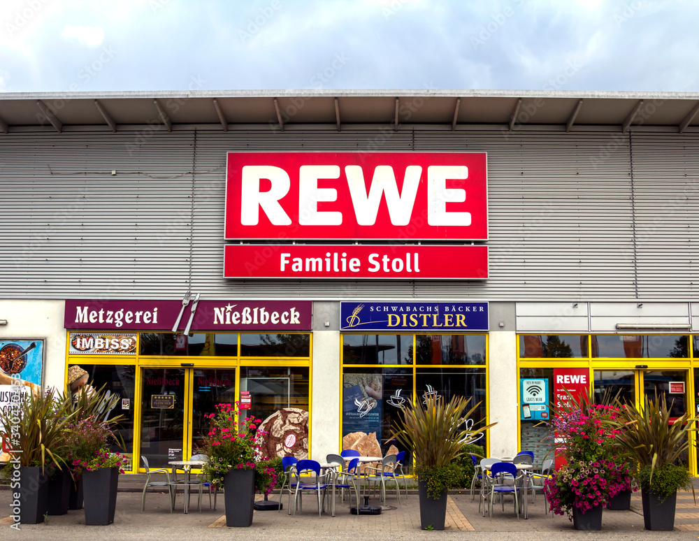 Schwabach, GERMANY: REWE supermarket chain sign. REWE is a GERMAN ...