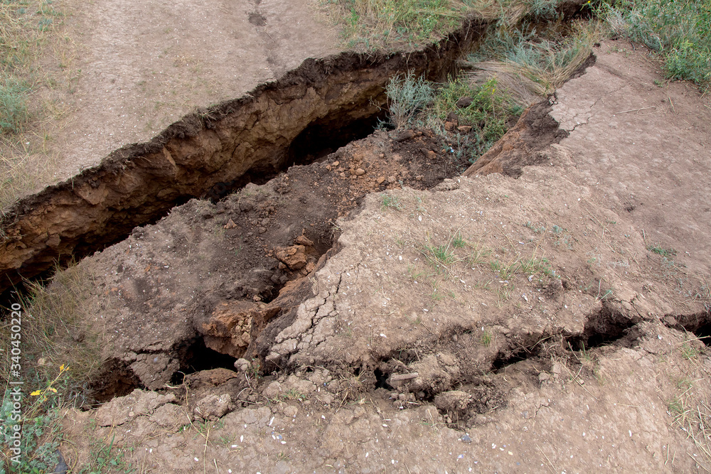 landslide in an environmentally hazardous area large crack in ground ...