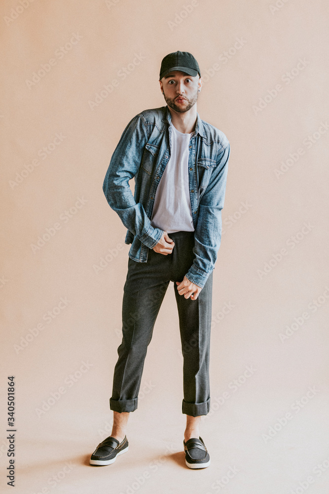 Edgy male model posing Stock Photo | Adobe Stock