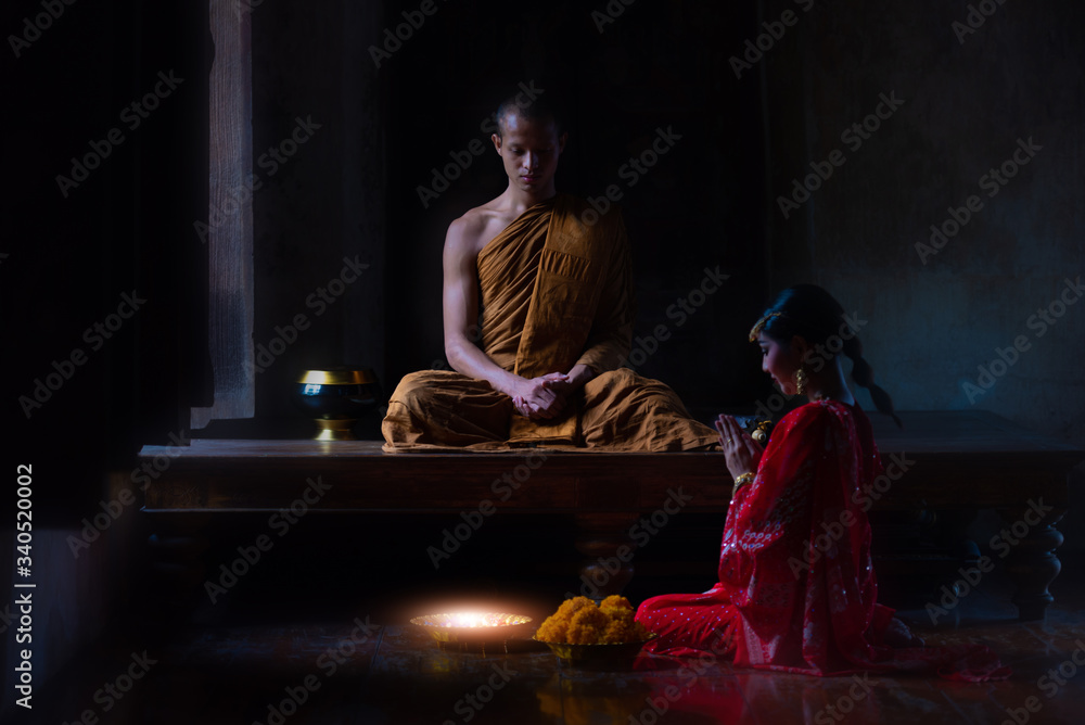 Girl wearing Indian clothes and monks in temple Stock Photo | Adobe Stock