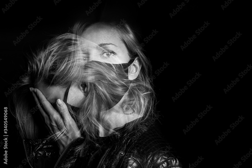 Sad woman in face respirator mask. Dark sad mood. environmental ...