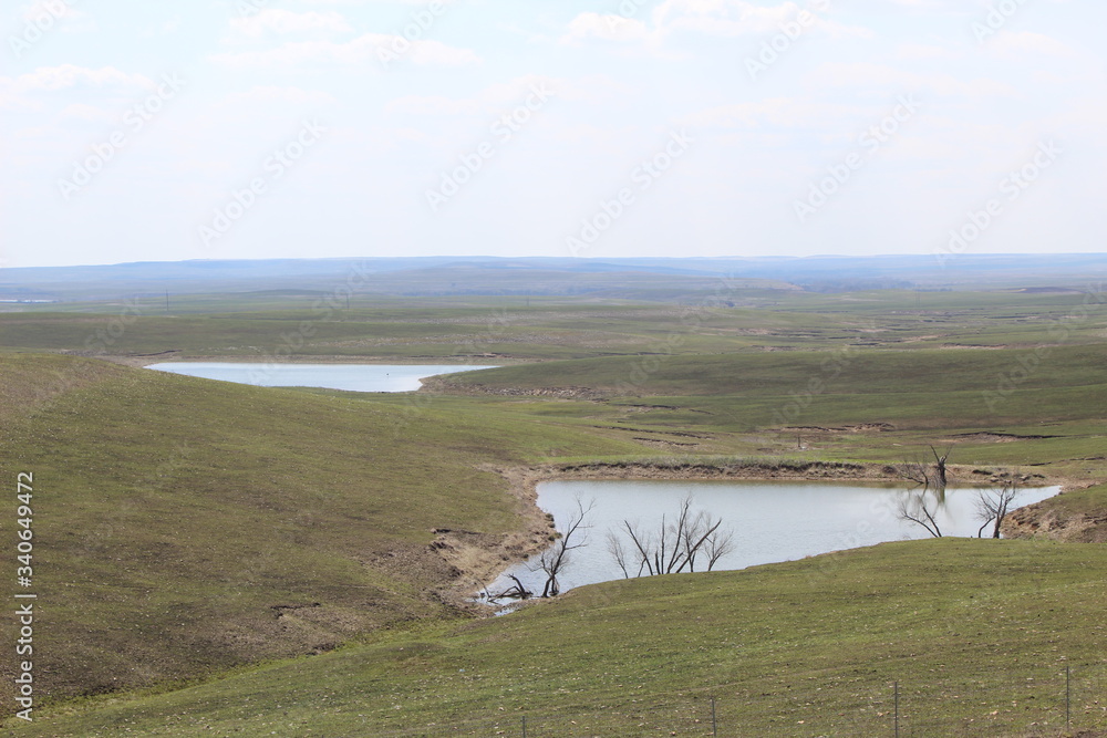 Watering ponds for cattle in the Flint Hills during spring in Kansas ...