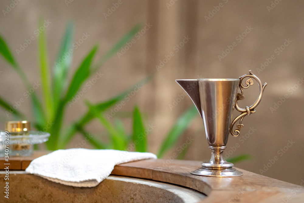 Holy Water Jug for christening or baptism of baby at church Stock Photo ...