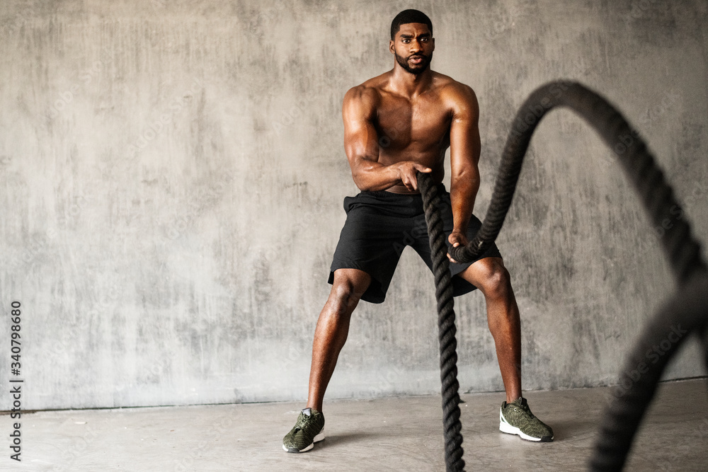 Battle ropes exercise Stock Photo | Adobe Stock