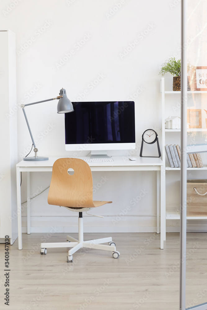 Vertical background image of empty office workplace behind glass wall ...