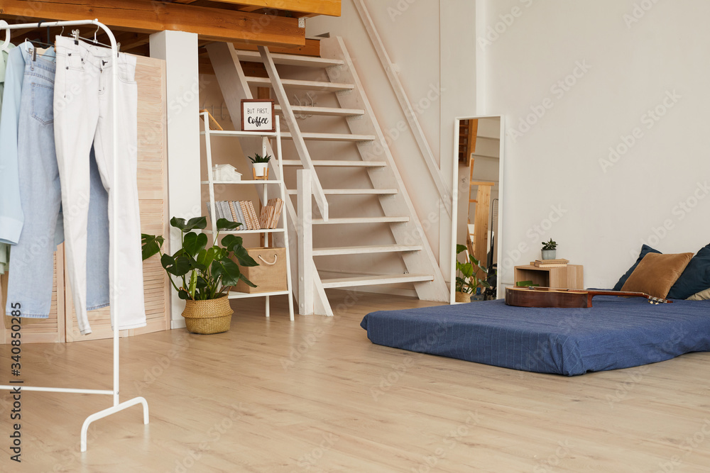 Background image of minimal bedroom interior with low bed and wooden ...