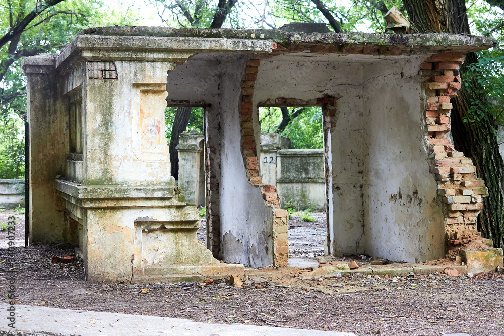 Ruined, brick building. The ruins of a collapsed building in the forest ...