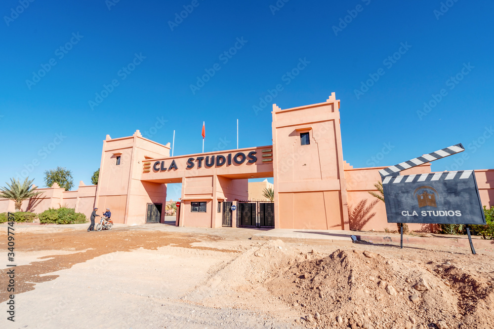 Main gate and advertising clipperboard of CLA Studios in Morocco Stock ...