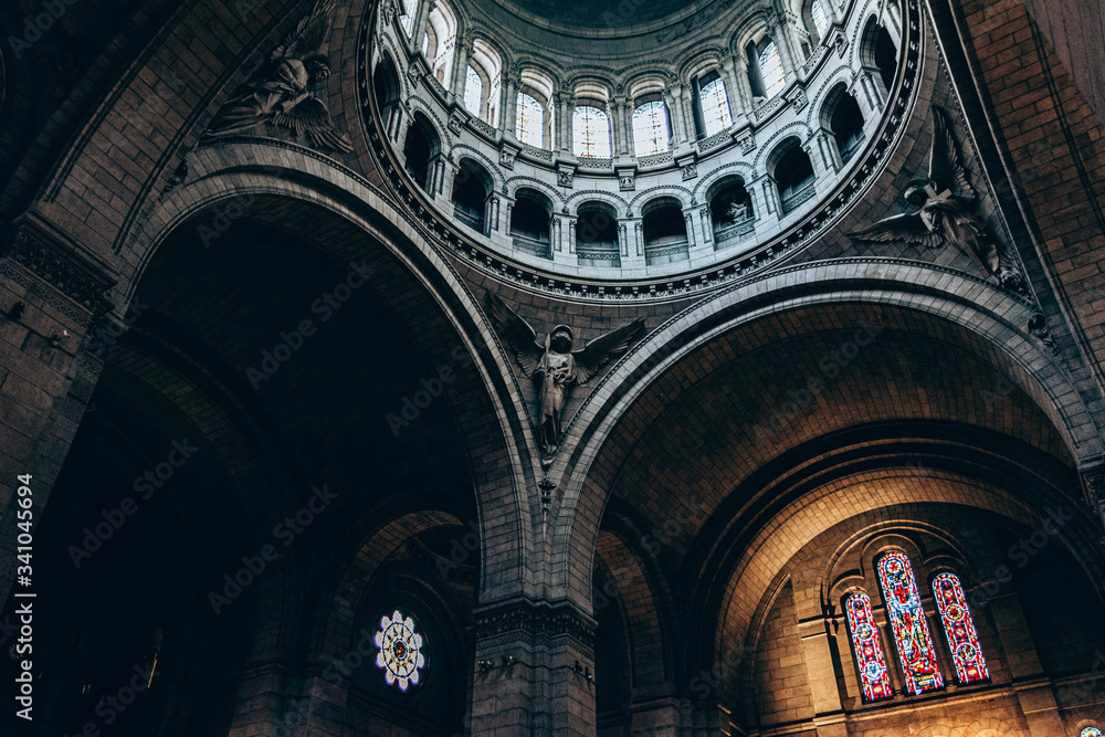 interior of a cathedral, view to the ceiling. Detail of the arches and ...