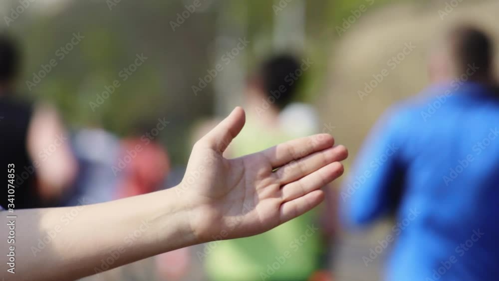 Shot unrecognizable runners on city street for commercial use ...
