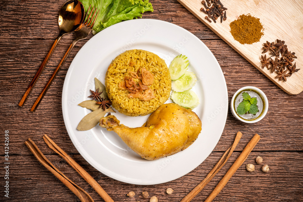 Delicious spicy chicken biryani on rustic wooden background, Chicken ...
