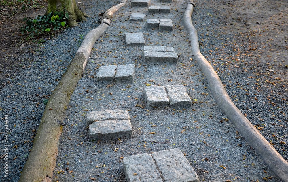 Tactile path for bare feet awakens the senses and uneven endings on the ...