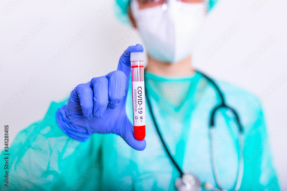 coronavirus covid 19 infected blood sample in sample tube in hand of ...