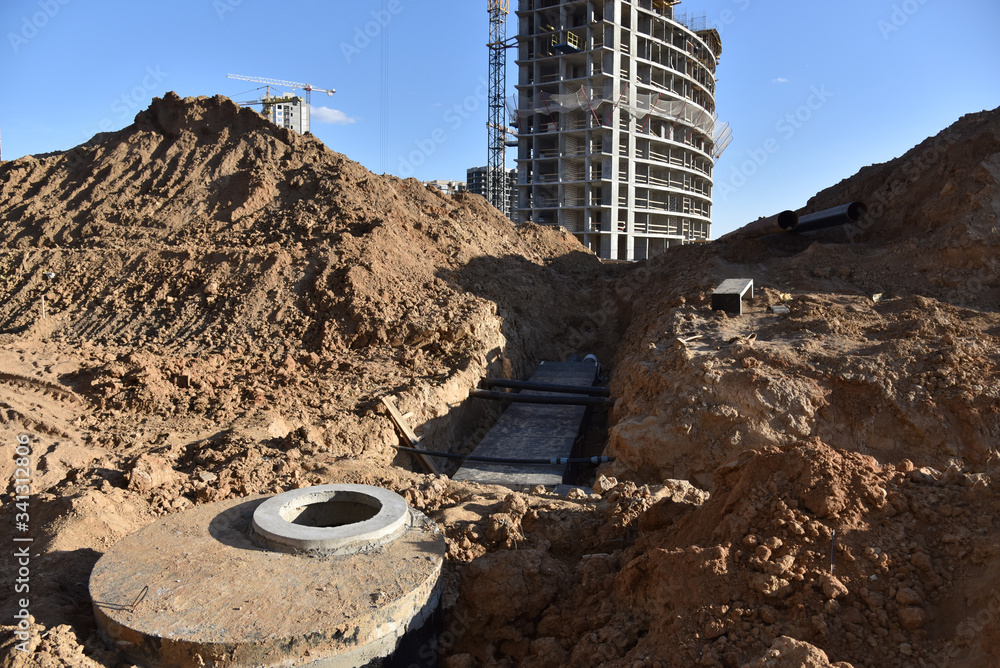 Laying concrete manholes and heating drain pipes and for stormwater ...