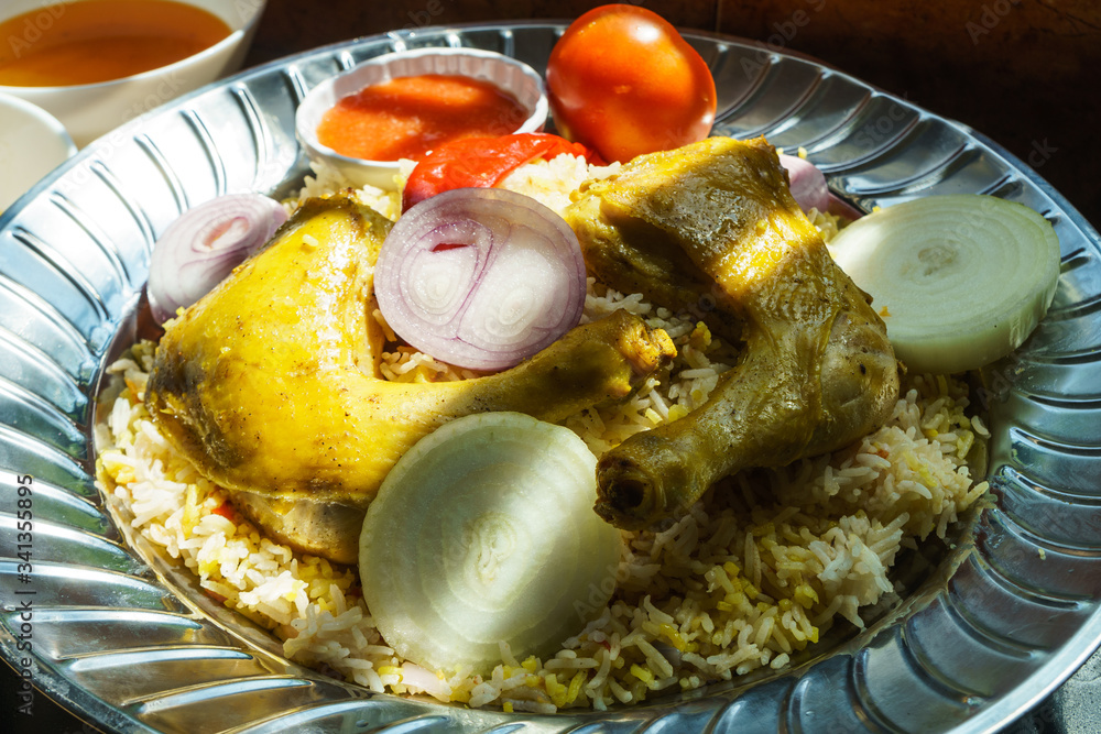 arabic chicken mandi rice with sauce Stock-Foto | Adobe Stock