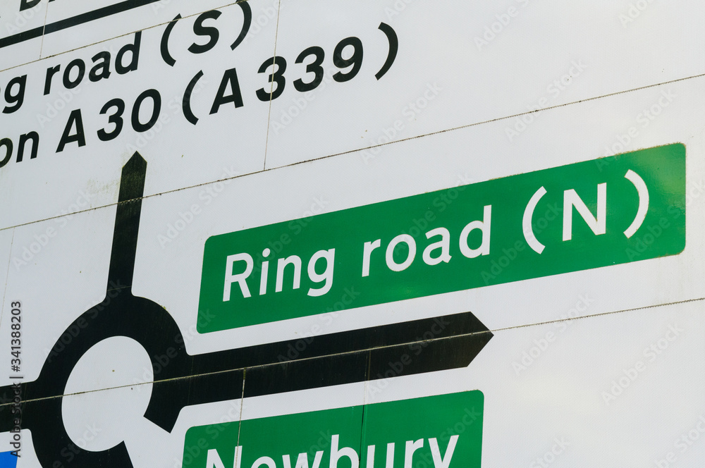 Road sign showing directions to Ring Road from a roundabout Stock Photo ...