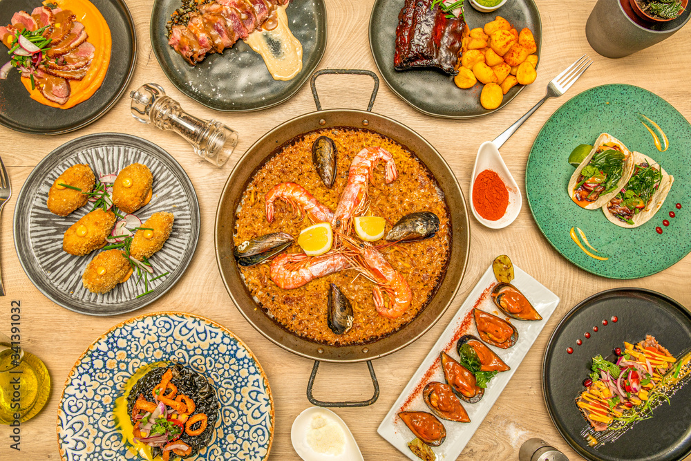 overhead photo of varied typical Spanish food Stock Photo | Adobe Stock