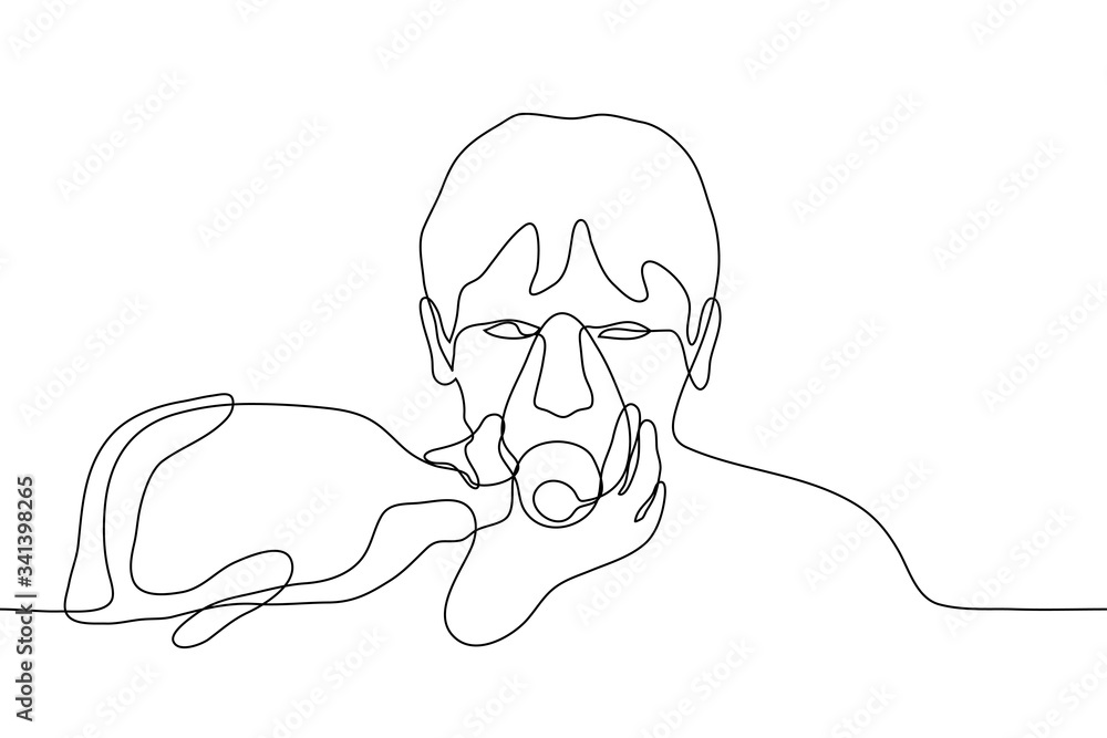 man with an oxygen mask through which he is given first aid. One ...
