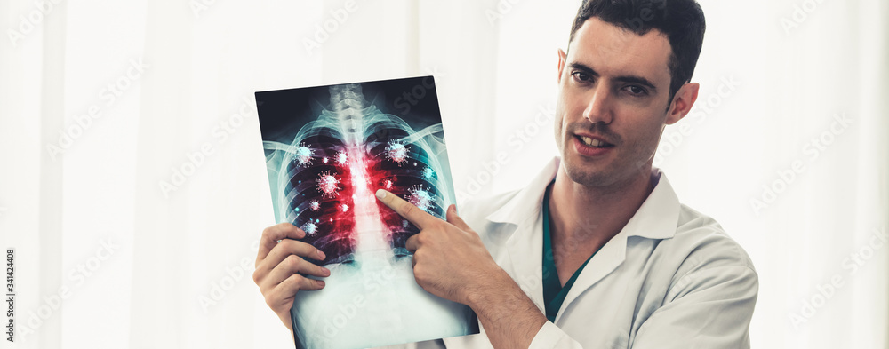 Doctor analyze Coronavirus Disease 2019 or Covid-19 displayed on x ray ...