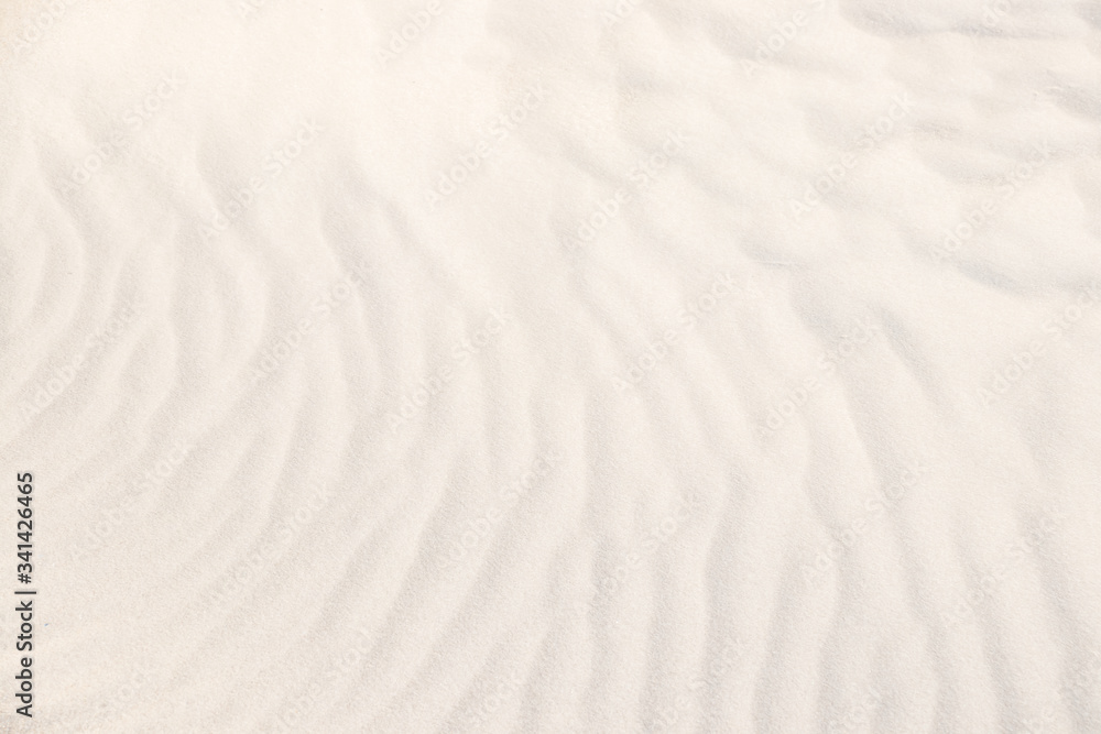Background with waves sand. Light patterns on the sand of dune. Sand ...
