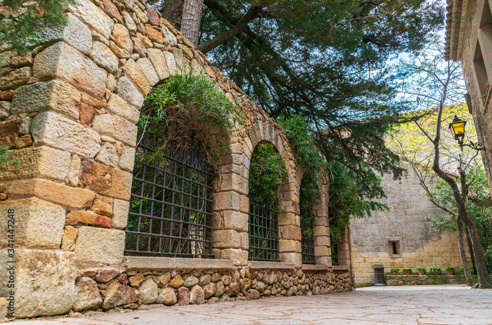 Details of the medieval streets in the beautiful village of Pals in ...