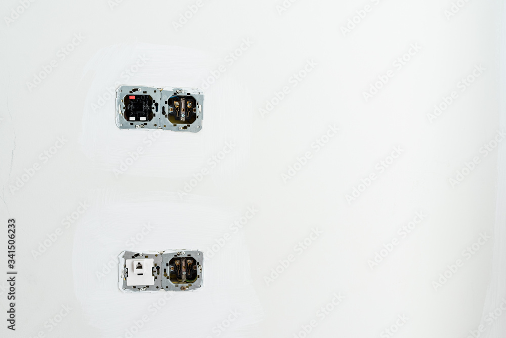 Electrical sockets and switches with the internal circuitry visible on ...
