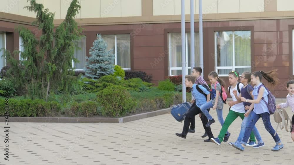 Group of kids going back from school together Stock Video | Adobe Stock