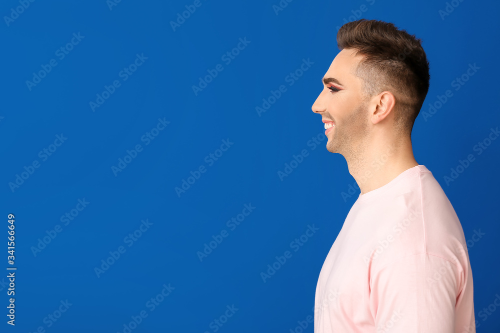 Portrait of young transgender woman on color background Stock Photo ...
