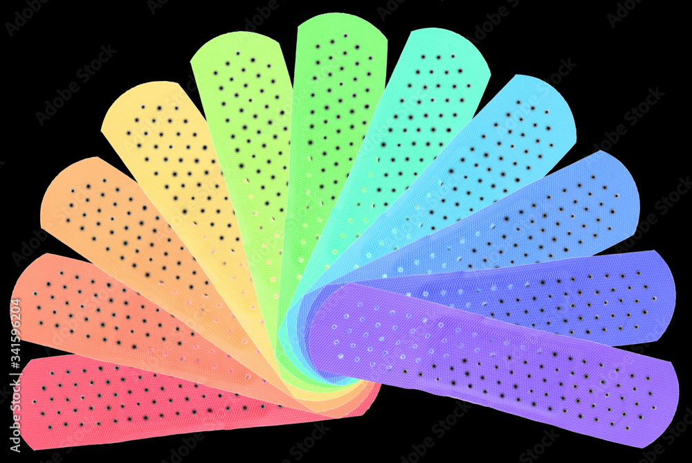 sparadrap perforé aux couleurs de l’arc-en-ciel, fond noir Stock Photo ...