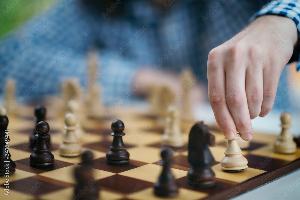 Hand of Chess Player Moving the Chess Piece Stock Photo | Adobe Stock