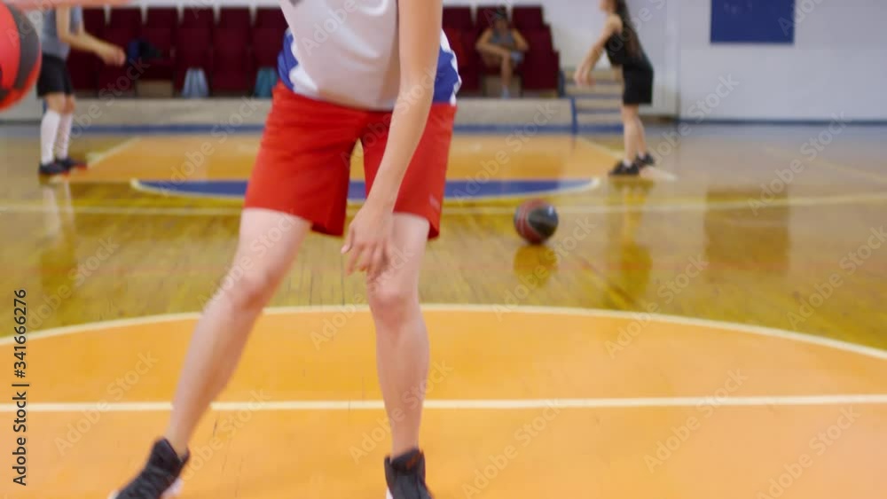 Vidéo Stock Skillful female athlete in sports uniform performing ...