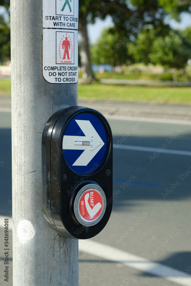 Stickers at traffic lights prompting pedestrians to use their elbows to ...