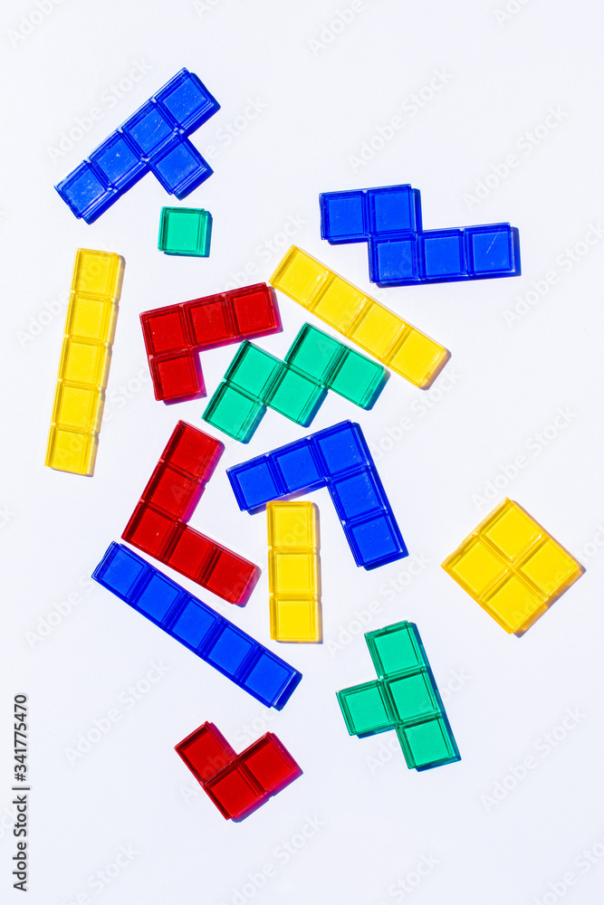 Colorful mixed square blocks on white background, high contrast colours, red blue yellow and ...