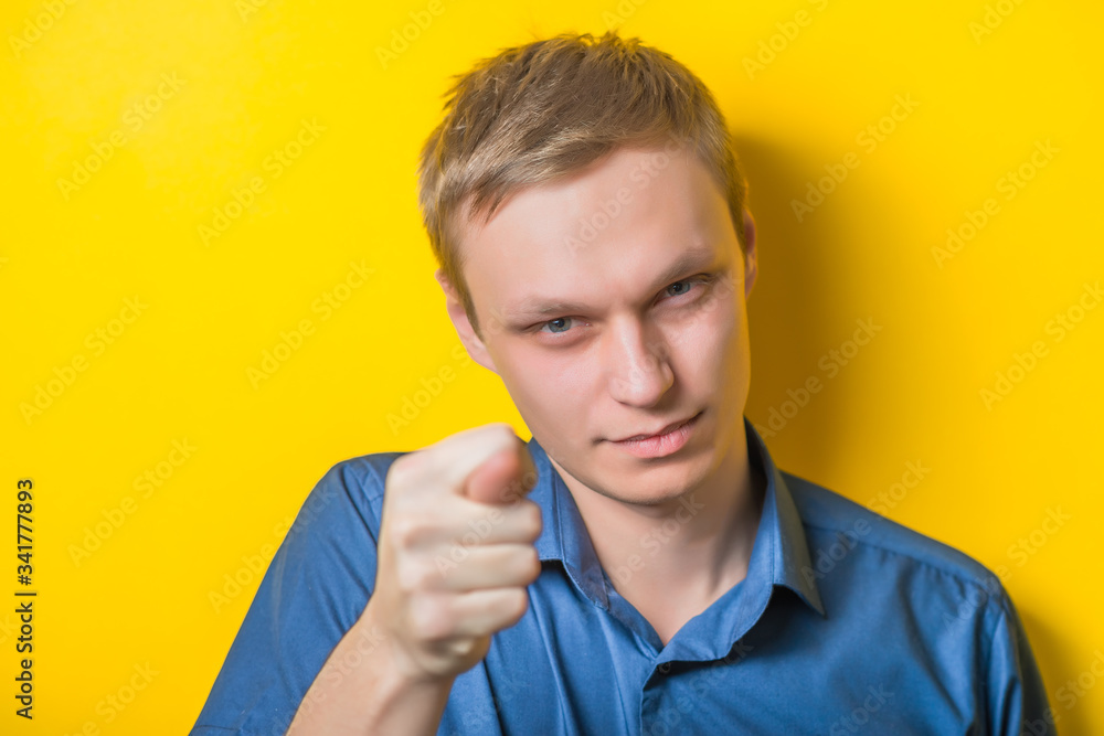 Closeup portrait unhappy young man giving thumb, finger fig gesture you ...