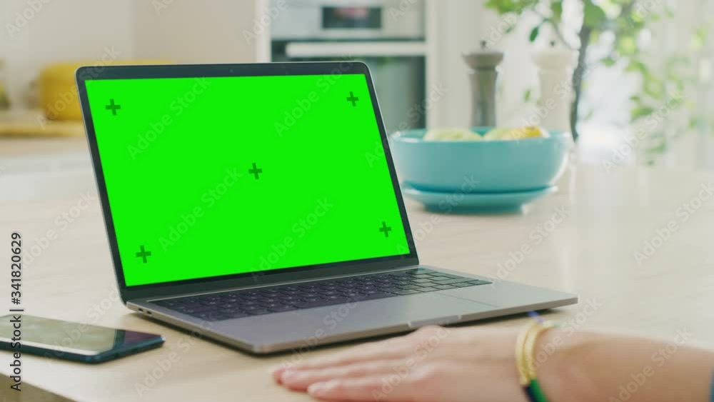 Close Up Green Screen Mock Up on a Laptop Computer. Device is Used on a ...