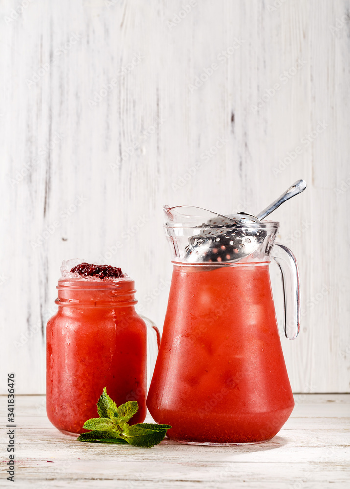 Traditional Mexican beverage refreshment in a jar and glass flavored ...