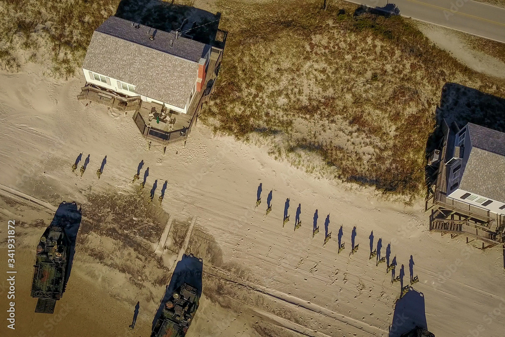 amphibious vehicles on the beach during the Amphibious Bold Alligator ...