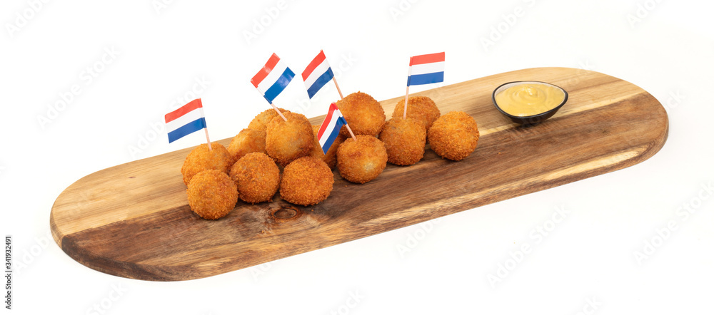 Dutch traditional snack bitterbal on a serving board, dutch flag Stock ...