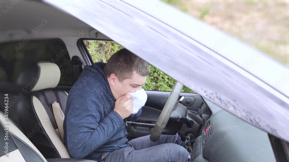 A ride during a car trip. The driver suffers from kinetosis, motion ...