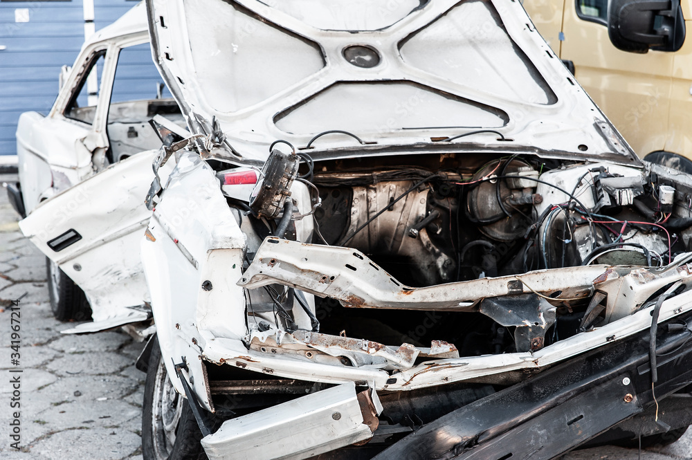 White car completely destroyed in accident. Scrapyard car Stock Photo ...