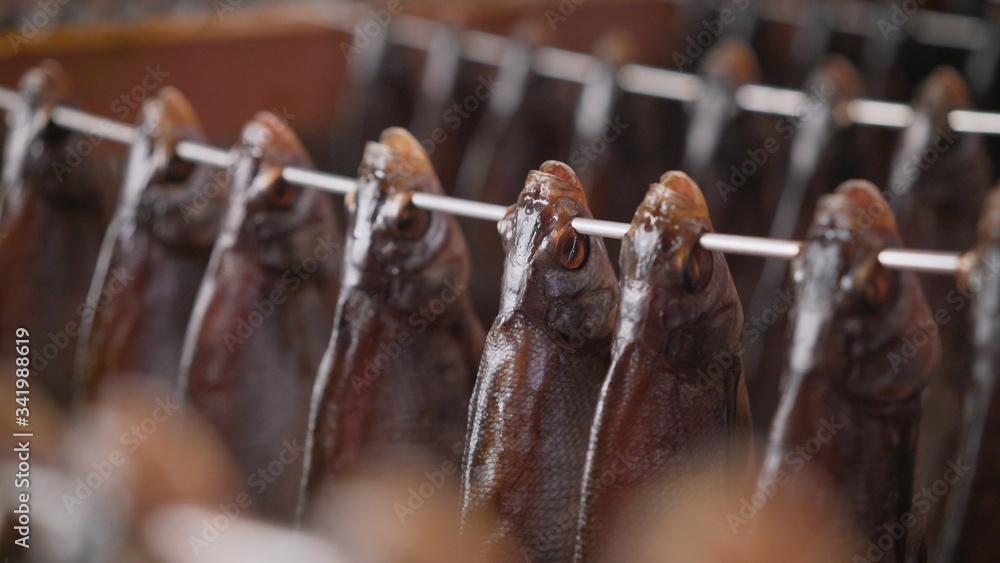 Mass drying of dried fish at a fish factory. Dried cod at a Norwegian ...