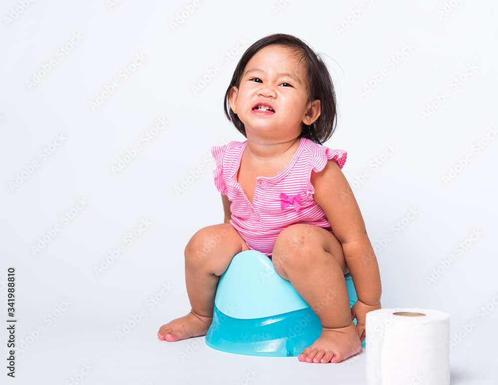 Asian little cute baby child girl education training to sitting on blue ...