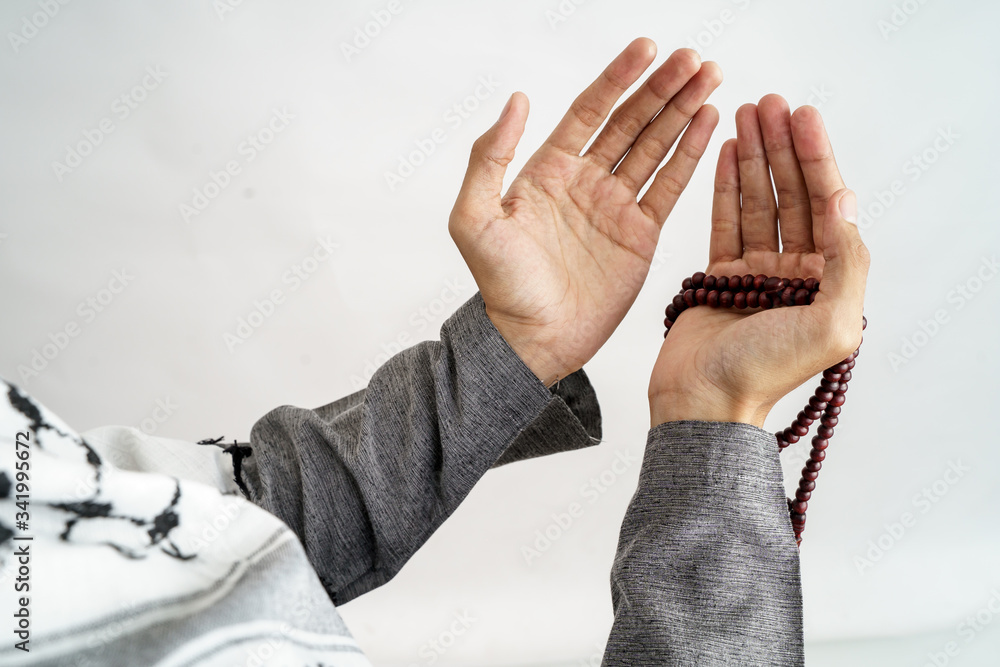 gesture of hand open arm while pray in islamic culture carrying prayer ...